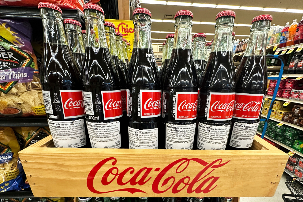 Premium drinks and mini cans help Coca-Cola boost third quarter results ...